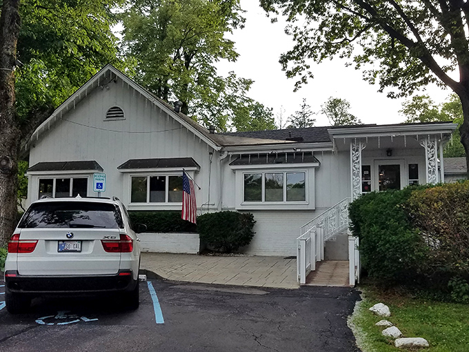 The charming white cottage exterior of Hollyhock Hill looks more like grandma's house than a restaurant&mdash;that's how you know the food will be incredible.