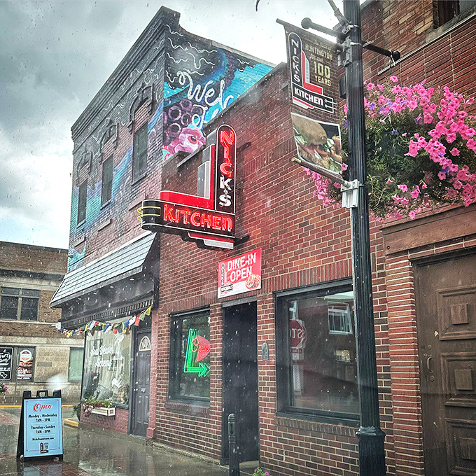 The brick-red corner building stands like a sentinel of satisfaction, promising comfort food treasures within its unpretentious walls.