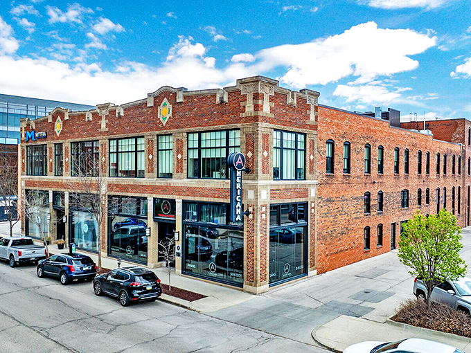 Americana's historic brick exterior stands proudly on a Des Moines corner, promising culinary adventures within. The architectural character alone is worth the visit.