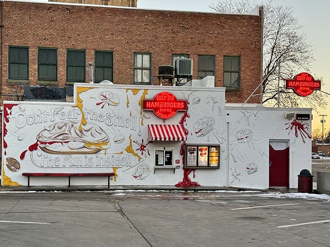 The unassuming white exterior of Cozy Inn belies its legendary status. Like finding a Picasso at a yard sale, this humble building houses burger greatness.