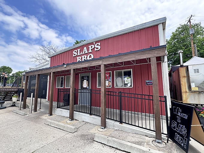 The fortress of flavor stands unassuming on a Kansas City corner, a chalkboard sign hinting at the magic happening inside.