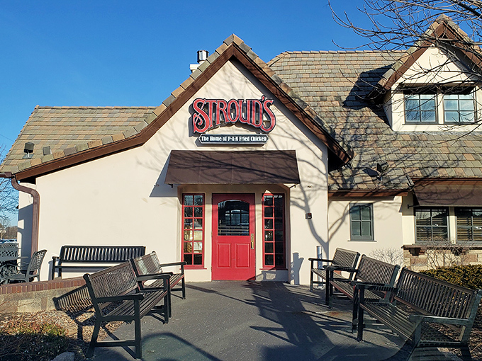 The iconic red doors of Stroud's welcome you like an old friend's embrace &ndash; promising comfort and legendary fried chicken inside.