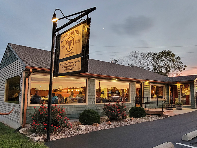 The little blue steakhouse with the big wooden sign says it all: "The Little Steak House Across From The Big House." Unpretentious perfection awaits.
