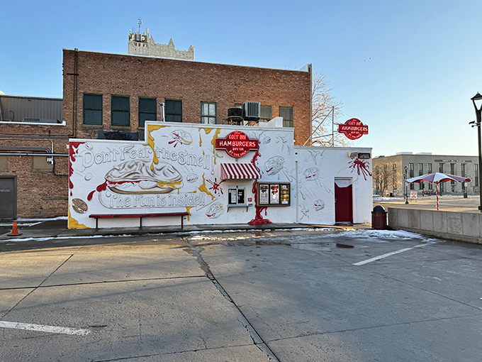 The unassuming white building with its iconic red awning has been stopping traffic in Salina since Calvin Coolidge was president.