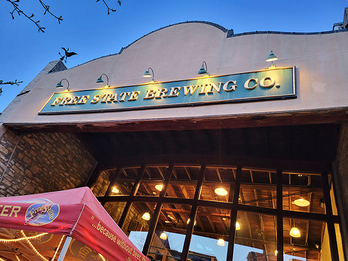 The iconic fa&ccedil;ade of Free State Brewing Company stands proudly on Massachusetts Street, like a beacon calling all hungry travelers home.