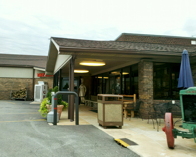 The unassuming exterior of Moonlite Bar-B-Q Inn hides a Kentucky treasure that's been perfecting smoky delights since 1963. Barbecue paradise awaits!