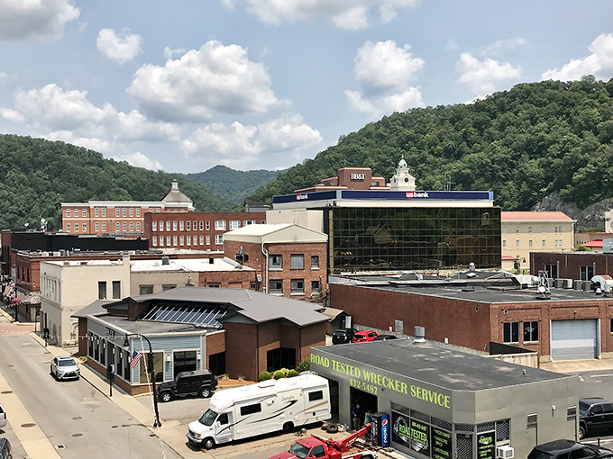 Downtown Pikeville greets you with that perfect small-town charm where the historic courthouse stands proudly against a backdrop of Appalachian mountains and blue skies.