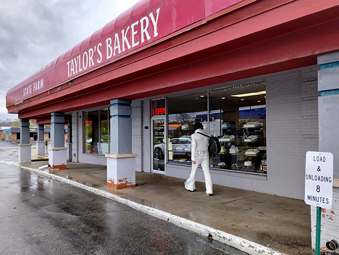The iconic red awning of Taylor's Bakery stands as a beacon of sweetness in Indianapolis, promising delectable treasures within its unassuming exterior.