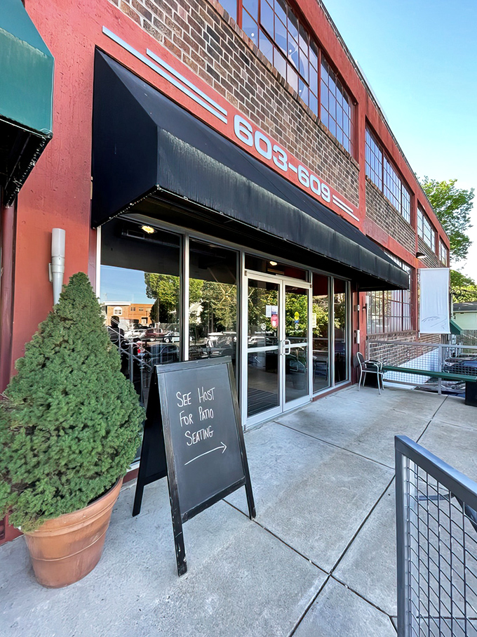 The unassuming red brick exterior of Cyrano's Cafe stands like Clark Kent before transformation &ndash; no cape needed, just carrot cake within.