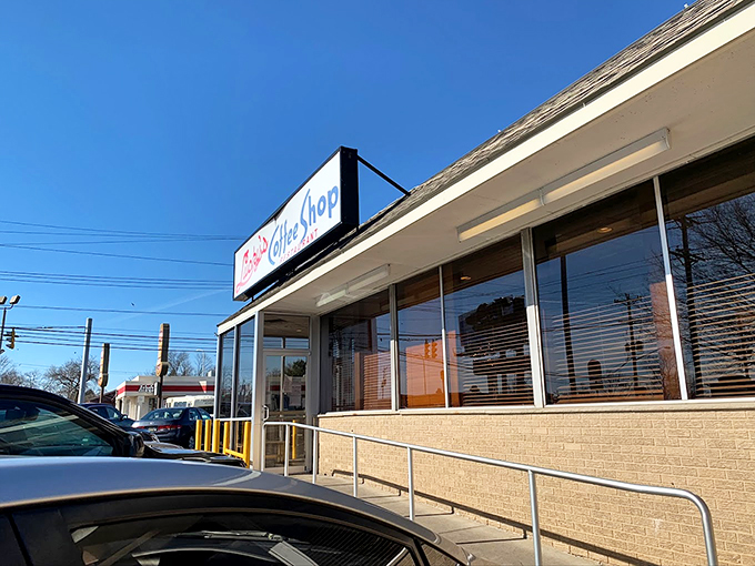 The classic brick exterior of Lucky's beckons like an old friend, witnessing more morning conversations than a therapist's office.