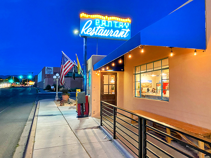 The neon glow of The Pantry's sign against the twilight sky is like a culinary lighthouse guiding hungry souls to shore.