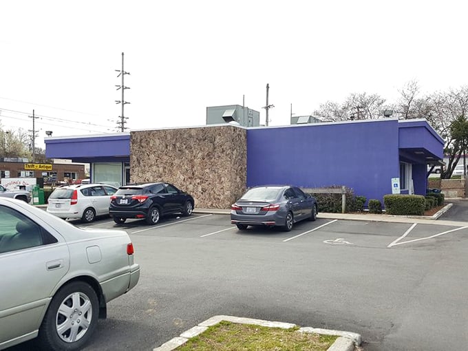 The purple exterior might surprise you, but that neon "OPEN" sign speaks a universal language that translates to "good food inside." 