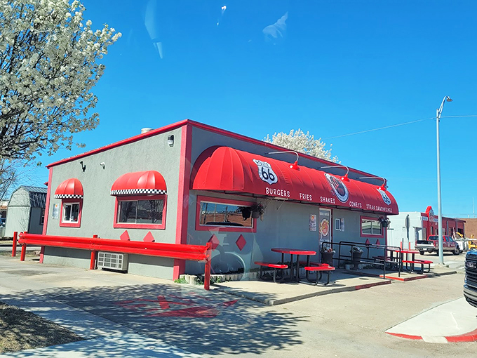 The classic Route 66 red awnings of Sid's Diner aren't just eye-catching&mdash;they're practically a beacon calling hungry travelers home to burger paradise.
