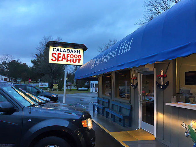 The modest blue awning and straightforward sign announce your arrival to seafood paradise. No fancy frills needed when the food speaks this loudly. 