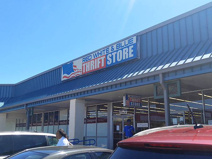 The patriotic blue roof and bold signage announce your arrival at treasure-hunting paradise. Budget-friendly dreams begin here! 