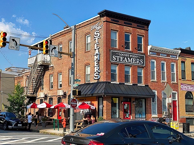 The corner brick building with its iconic vertical "STEAMERS" sign stands like a lighthouse for hungry seafood pilgrims in Baltimore's Locust Point neighborhood.