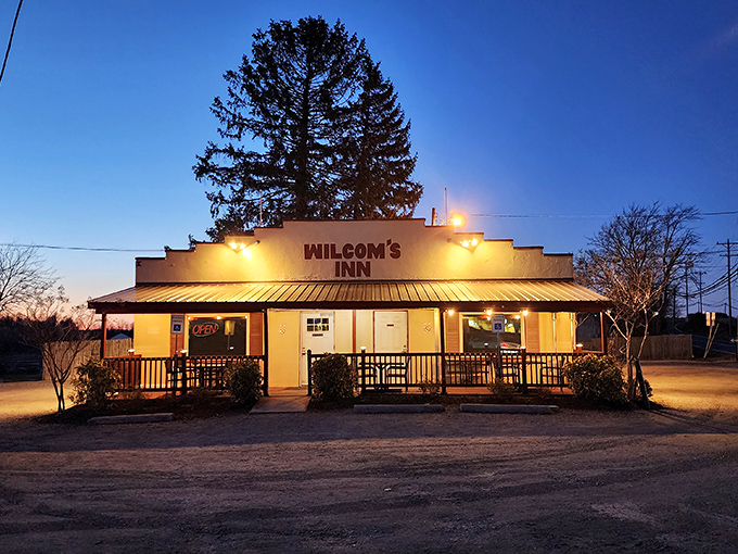The unassuming exterior of Wilcom's Inn stands as a culinary speakeasy&mdash;proof that the best flavors often hide behind the simplest facades.