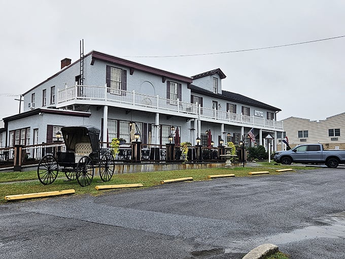 Colonial charm meets Maryland hospitality at the Carriage House Inn's pristine exterior, where that American flag isn't just decoration&mdash;it's a promise of classic American cuisine inside.