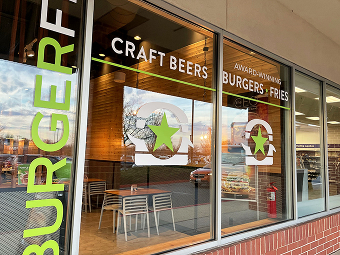 BurgerFi's Columbia storefront stands ready to welcome hungry Marylanders with its distinctive green signage and brick facade&mdash;burger paradise awaits behind those doors.