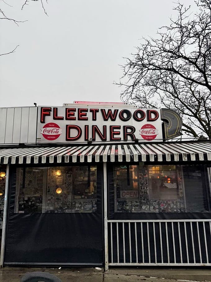 The iconic Fleetwood Diner sign glows like a beacon for hungry souls, promising comfort food and a slice of Ann Arbor history.
