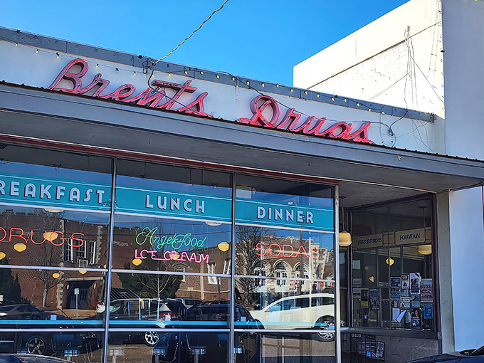 The iconic Brent's Drugs sign glows like a beacon of nostalgia, promising comfort food and conversations that matter in Jackson's Fondren District.