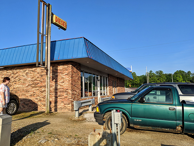The unassuming exterior could be easily missed, but locals know better than to judge this culinary treasure by its modest brick-and-blue-roof cover.
