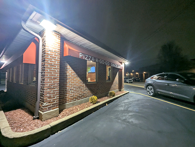 The unassuming brick exterior of Pizza-A-Go-Go has been welcoming hungry St. Louisans since 1967, proving great pizza doesn't need flashy signage.