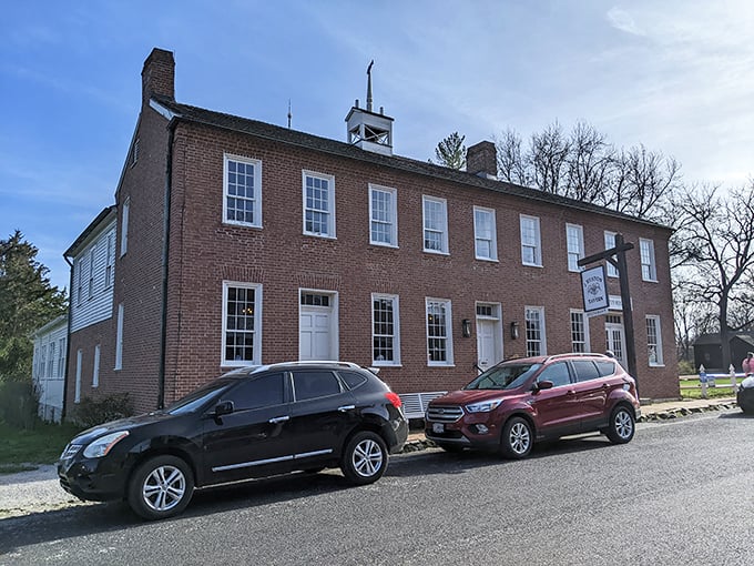 The historic red brick exterior of J. Huston Tavern stands proudly since 1834, making it the oldest continuously operating restaurant west of the Mississippi. 