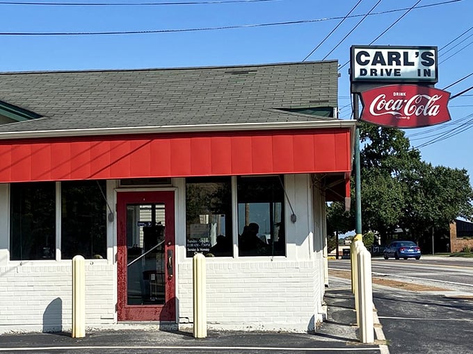 Classic Americana never goes out of style at Carl's Drive-In, where the iconic red awning has beckoned hungry travelers since 1959.