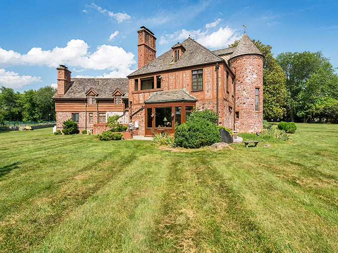 Redwall Castle stands proudly against the Maryland sky, its reddish-brown stonework and circular turret looking like it was plucked straight from a European countryside.
