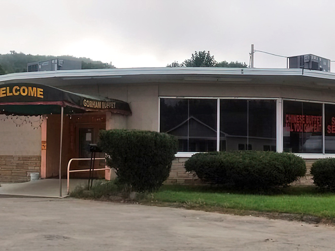 The Dynasty Buffet's exterior stands resolute against New Hampshire's moody skies, a beacon of culinary comfort for hungry travelers and locals alike.
