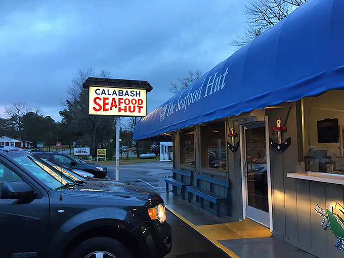 The blue awning says it all: simple, unpretentious, and housing seafood treasures that would make Neptune himself swim upstream for a taste.