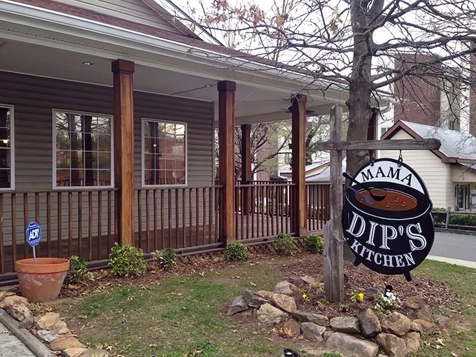 The unassuming wooden sign outside Mama Dip's says it all - traditional country cooking awaits behind that welcoming front porch. 