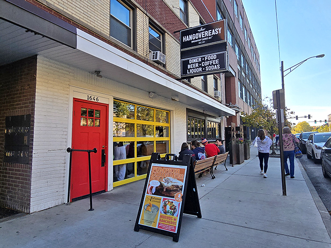 The bright red door and sunny yellow windows of Hang Over Easy beckon like a breakfast lighthouse on Neil Avenue, promising salvation for hungry souls.
