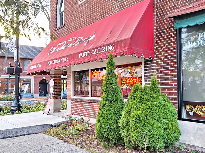 The iconic red awning of Maumee Valley Chocolate and Candy beckons like a sweet siren call to anyone with a pulse and a sweet tooth.