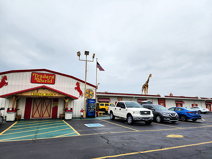 The iconic red and white entrance to Traders World beckons with its horse silhouettes and American flags&mdash;like the pearly gates of bargain heaven.