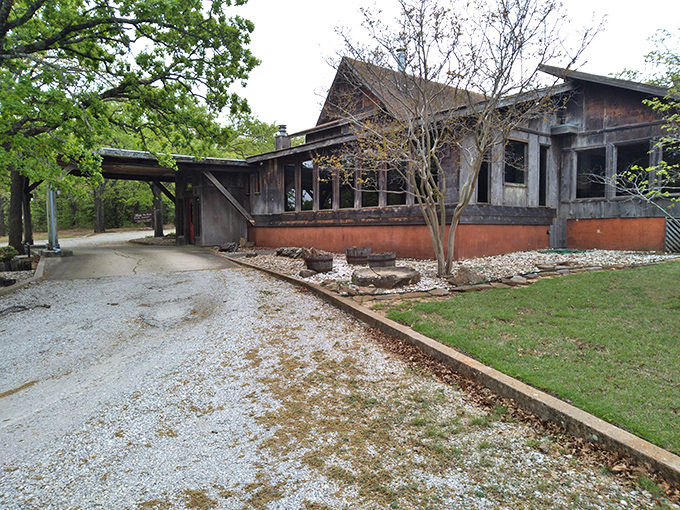 A garden path that promises culinary treasures ahead. Fireside Dining's entrance combines rustic charm with Oklahoma hospitality, inviting you to slow down and savor what's coming.