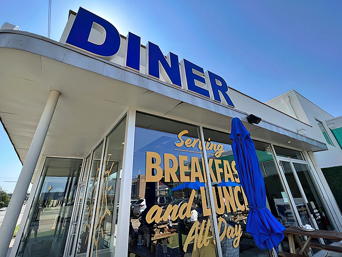 That iconic blue "DINER" sign isn't just advertising&mdash;it's a morning beacon of hope for the breakfast-deprived souls of Oklahoma City.