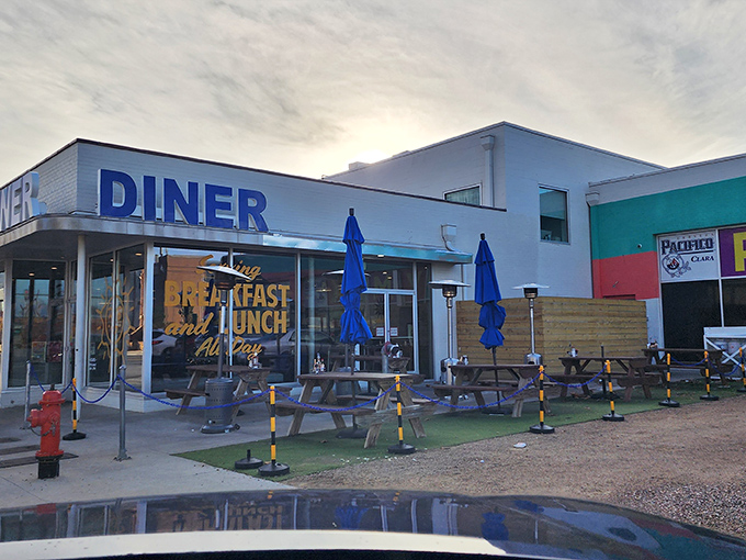 That iconic blue "DINER" sign isn't just advertising&mdash;it's a morning beacon of hope for the breakfast-deprived souls of Oklahoma City.