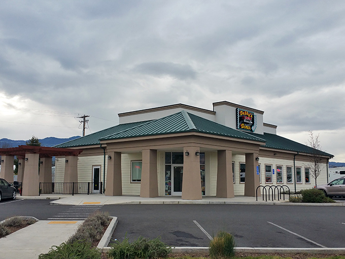 Debby's Diner stands proudly against Oregon's sky, its checkered sign promising a journey back to simpler times when calories weren't counted, just enjoyed. 