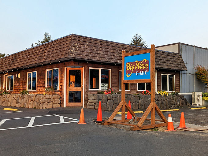 The unassuming exterior of Big Wave Caf&eacute; stands like a coastal secret &ndash; wooden shingles, blue trim, and a simple sign promising oceanic delights within.