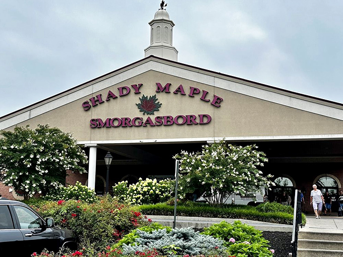 The grand entrance to Shady Maple stands like a culinary cathedral in Pennsylvania Dutch Country, promising gastronomic salvation within its welcoming walls.