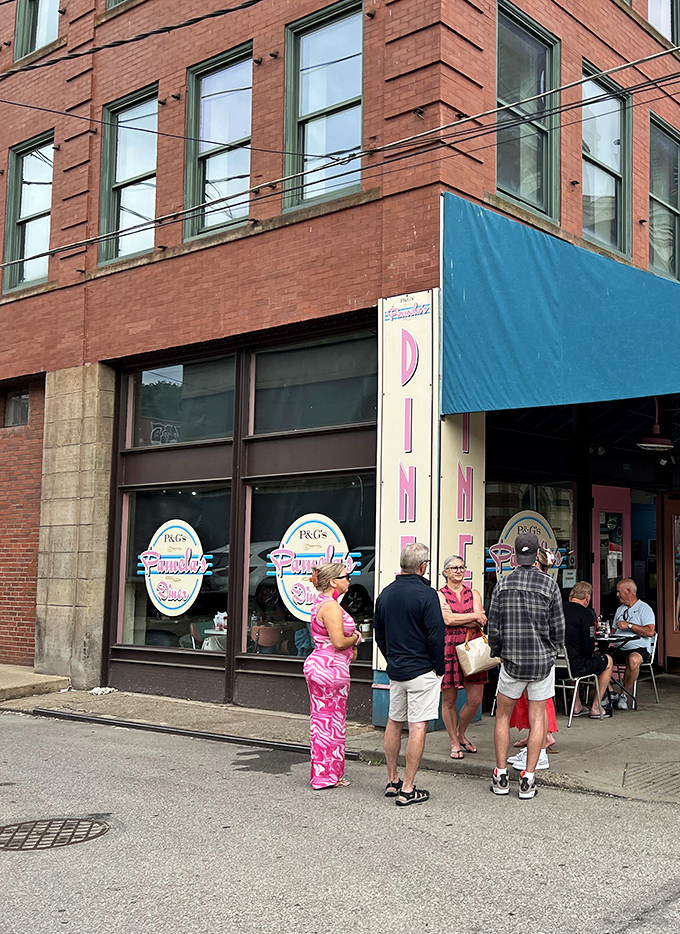 The iconic teal awning of Pamela's Diner beckons hungry Pittsburghers like a breakfast lighthouse guiding ships to delicious shores.