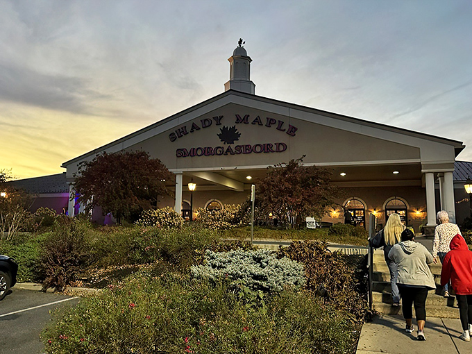 The majestic entrance to Shady Maple Smorgasbord stands proudly against the Pennsylvania sky, promising culinary adventures that would make even the most disciplined dieter surrender willingly.