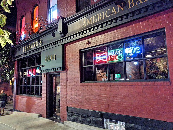 The unassuming pink brick exterior of Tessaro's hides culinary greatness like a superhero's secret identity. Pittsburgh's burger temple awaits.