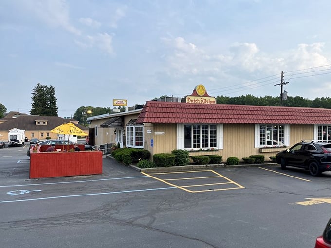 The red-roofed sanctuary of comfort food stands proudly on Route 61, its vintage sign and hex symbol beckoning hungry travelers like a Pennsylvania Dutch lighthouse.