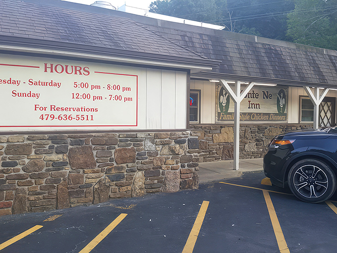 The unassuming exterior of Monte Ne Inn Chicken stands like a humble guardian of culinary treasures. No fancy frills, just the promise of legendary fried chicken within.