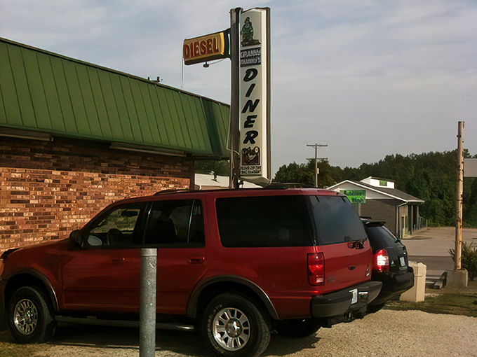 The unassuming exterior could be easily missed, but locals know better than to judge this culinary treasure by its modest brick-and-blue-roof cover. 
