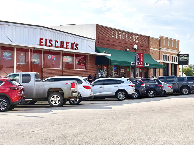 The unassuming brick fa&ccedil;ade of Eischen's Bar stands like a culinary lighthouse in Okarche, beckoning hungry travelers with its iconic green awning.