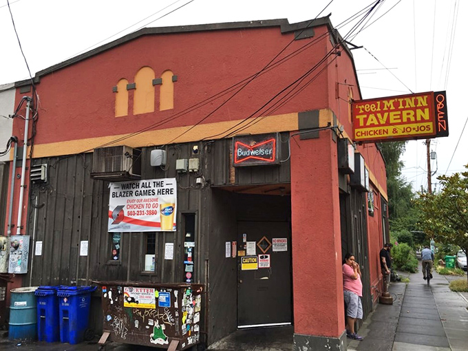 The unassuming red exterior of Reel M Inn stands like a culinary lighthouse on SE Division Street, beckoning hungry souls with its simple promise: "Chicken & Jojos."